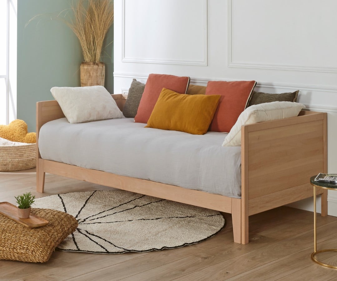 Gagnez de la place en transformant un lit en banquette